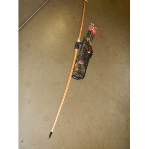 An English laminated longbow, 38lb at 28" draw, with arrows,... | Barnebys