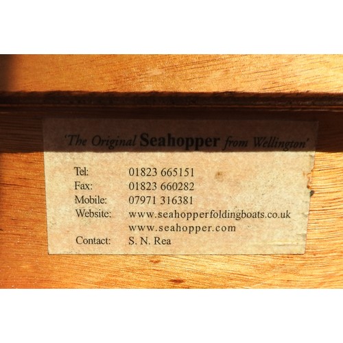 A 'SEAHOPPER' FOLDING PORTABLE SAILING DINGHY