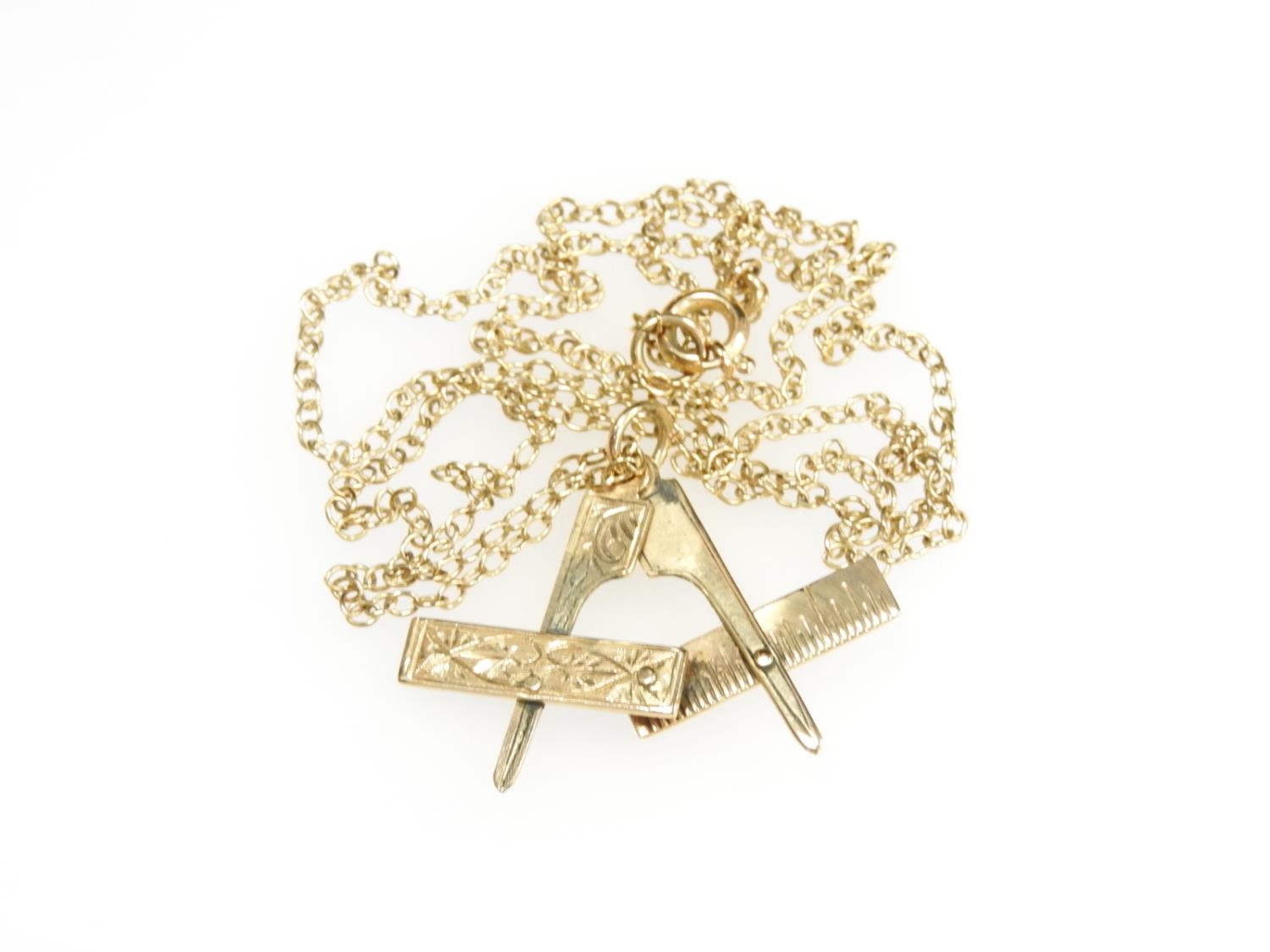 Masonic Interest: 9ct gold articulated dividers and set square pendant ...