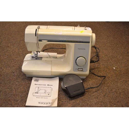 Toyota Model 4070 series electric sewing machine with instru... | Barnebys