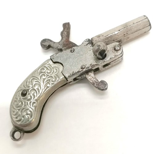 Miniature gun, firing pin works, some deterioration to the m... | Barnebys
