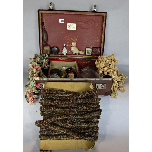 A small vintage suitcase 40cm wide, containing several metres of ...