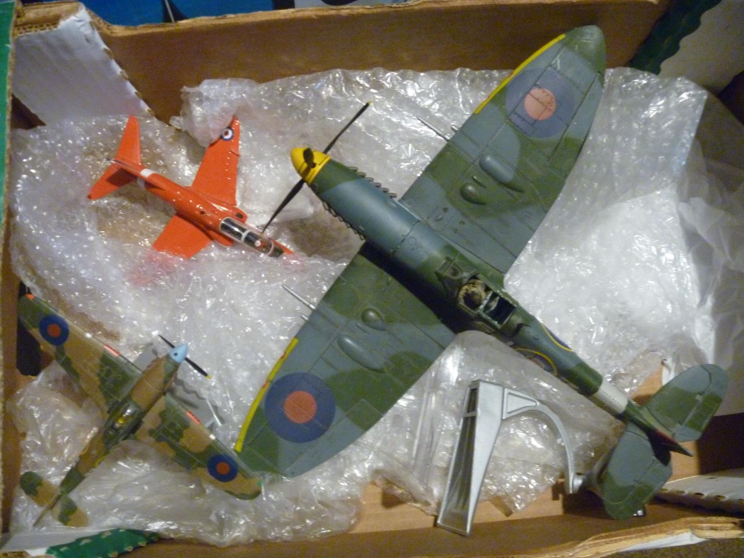 large metal model spitfire and two other aircraft