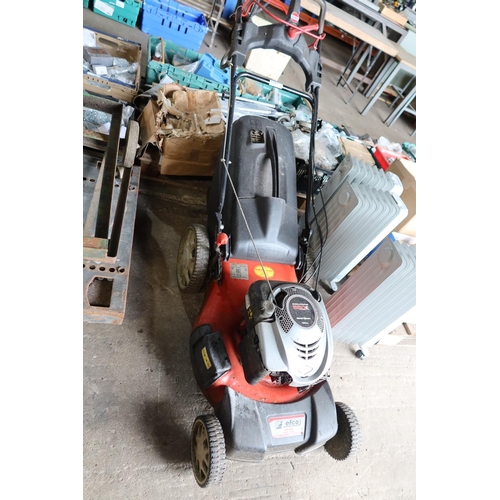 A petrol engine lawn mower by Efco type LR55 Four in One