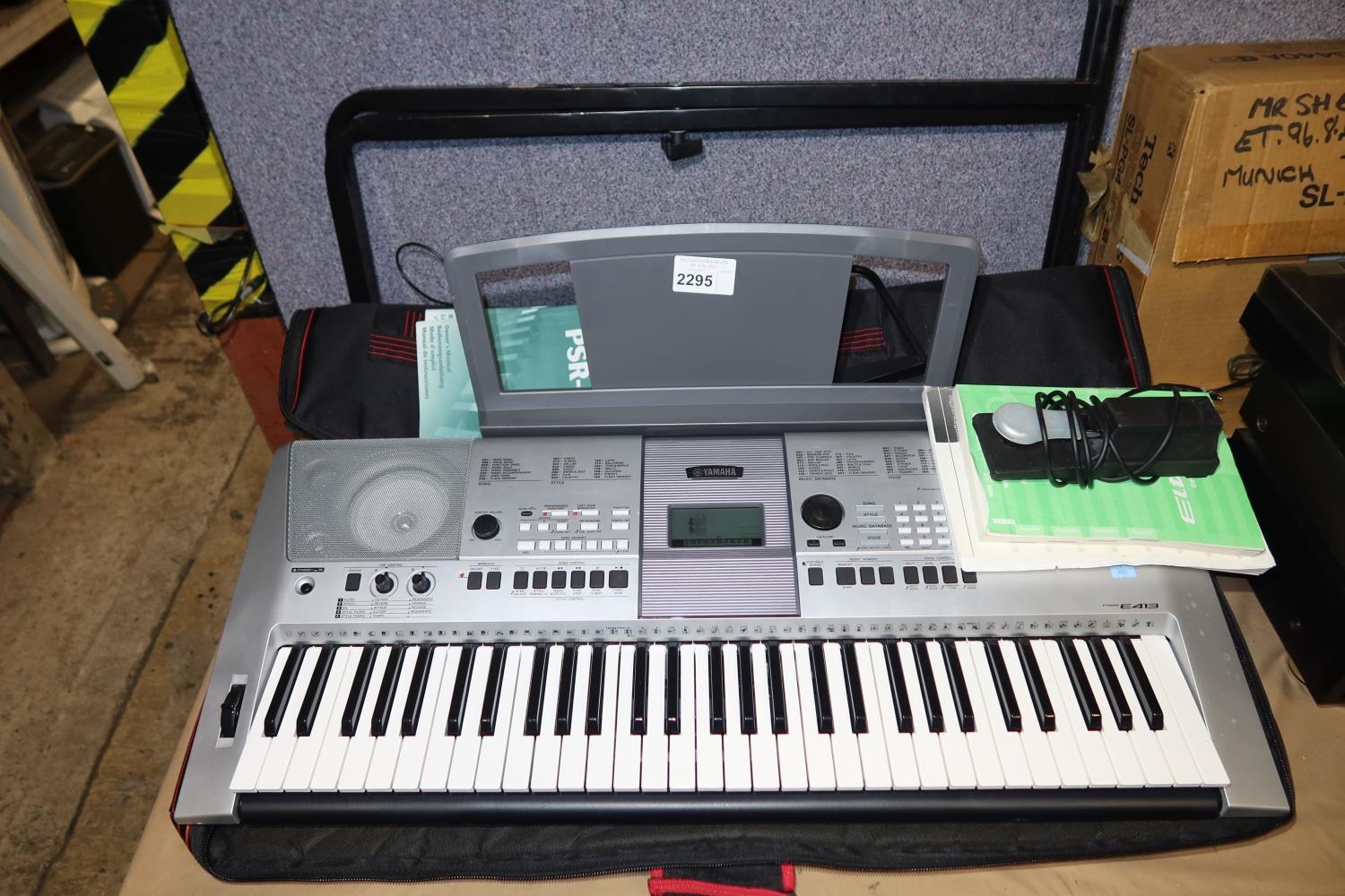 A 62 key piano keyboard by Yamaha type PSR-E413, comes with case ...