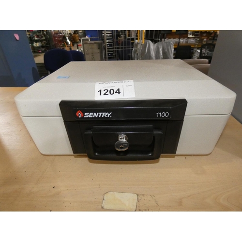 A small sentry safe box type 1100, keys in auction office