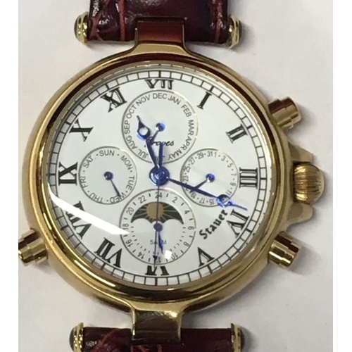 A gold-plated Stauer "Graves 33" Watch. Complete with original leather ...