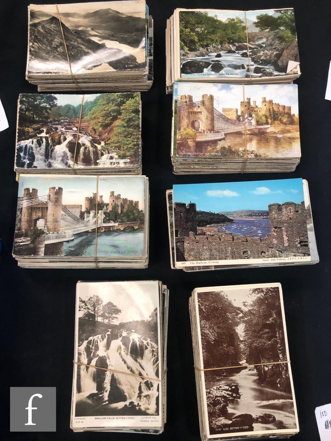 A large collection of Welsh postcards to include towns, landscape views ...