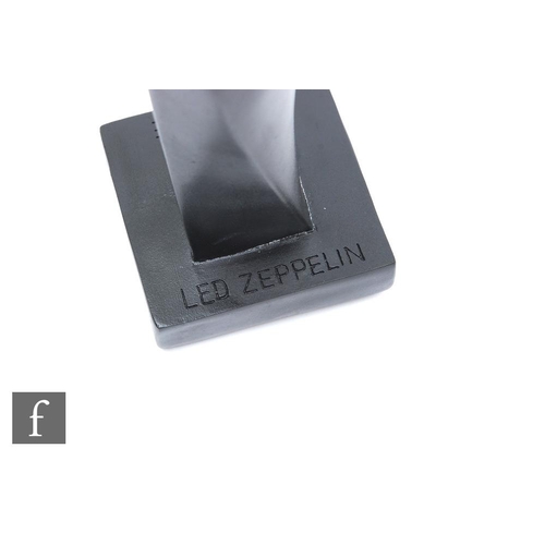 A replica Led Zeppelin 'The Object' statue, the black obelisk-shaped ...