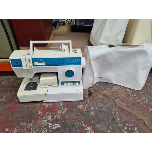 A mid 20th century Singer model 6240 electric sewing machine... | Barnebys