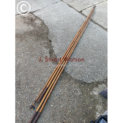 Four vintage bamboo long reach cable transfer poles | Barnebys