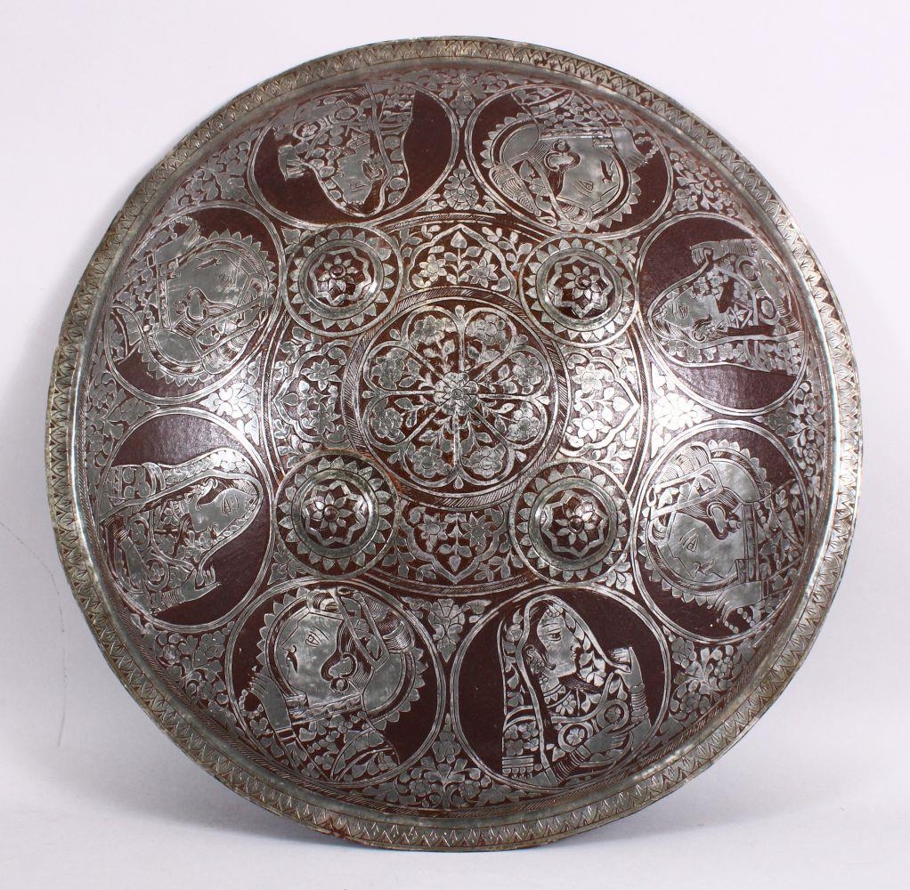 A 19TH / 20TH CENTURY INDIAN MUGHAL SILVER INLAID SHIELD, with figural ...