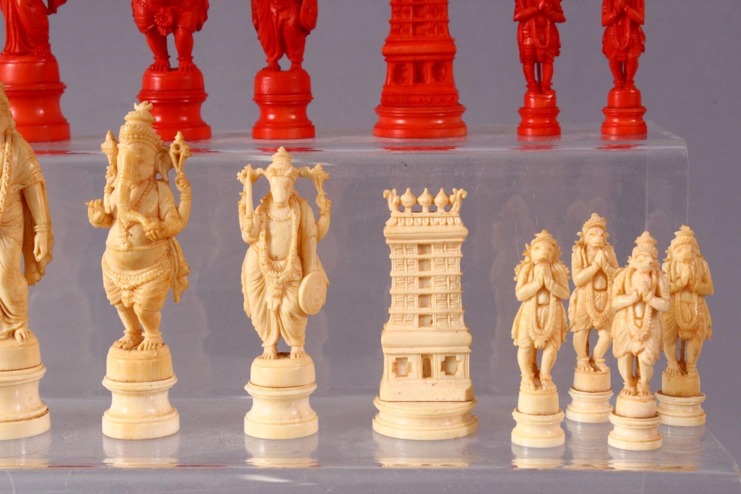 AN EARLY 20TH CENTURY IVORY AND STAINED IVORY INDIAN CHESS SET, carved ...