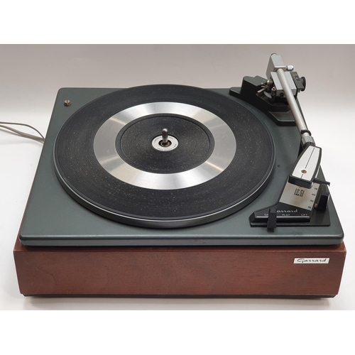 Garrard SP 25 Mk II turntable on Garrard plinth with lid. Po... | Barnebys