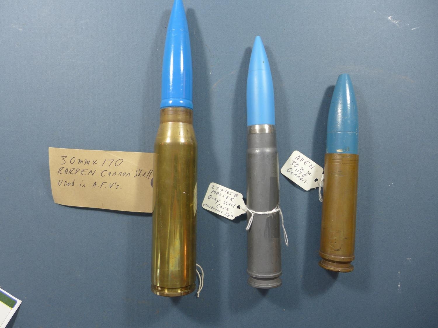 A 30 MM 170 RARDEN CANNON SHELL, MAUSER SHELL AND AN ADEN 30 MM