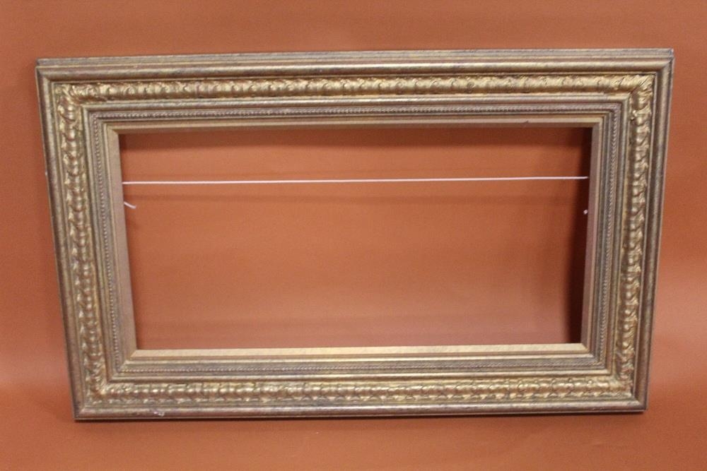 A 20TH CENTURY GILT PICTURE FRAME WITH GOLD SLIP -SLIP REBATE 31CM X ...