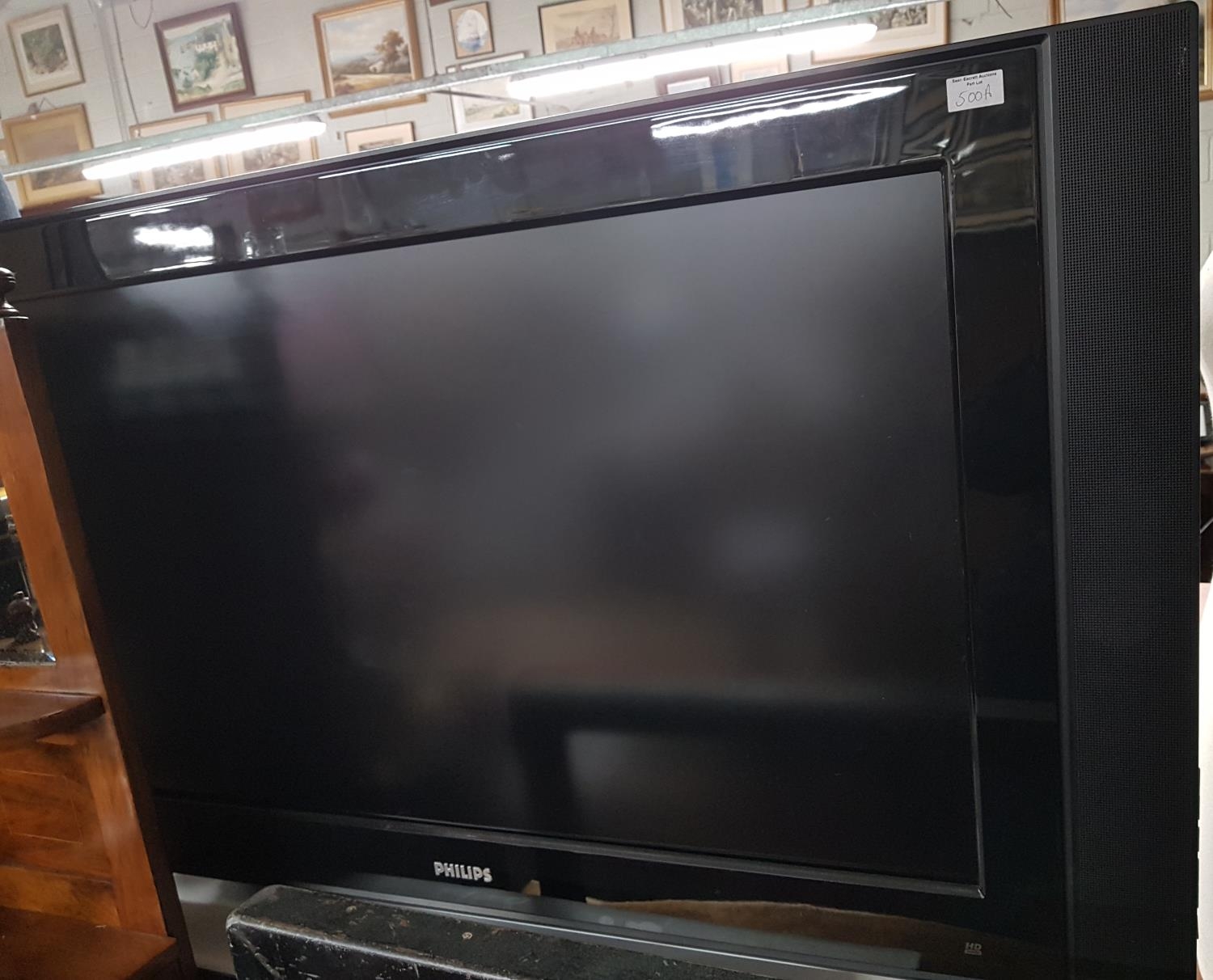 A 42" Philips flat screen TV, PWOATO.