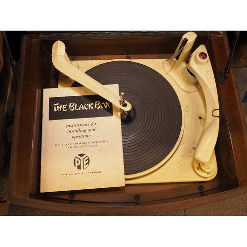A wooden cased Pye record player and a large quantity of vinyl and 78's