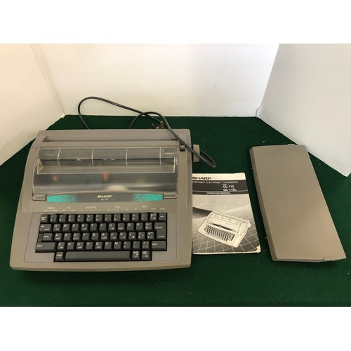 Electric SHARP typewriter with instruction manual (untested) | Barnebys