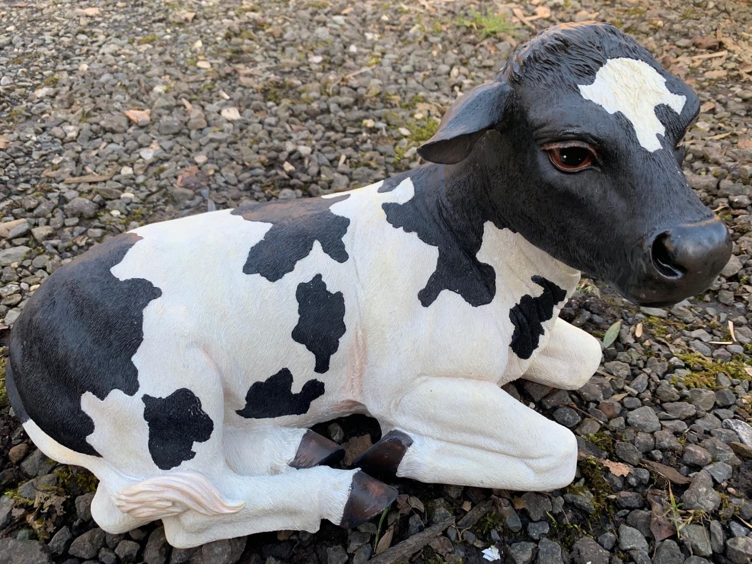 BOXED NEW RESIN COW LAYING