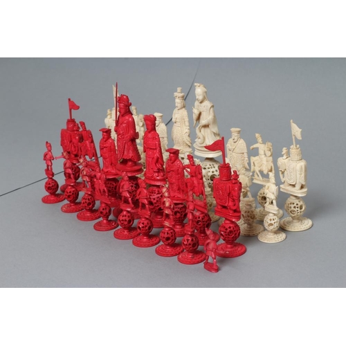 A COMPOSITE CHINESE IVORY PUZZLE BALL CHESS SET, natural and... | Barnebys