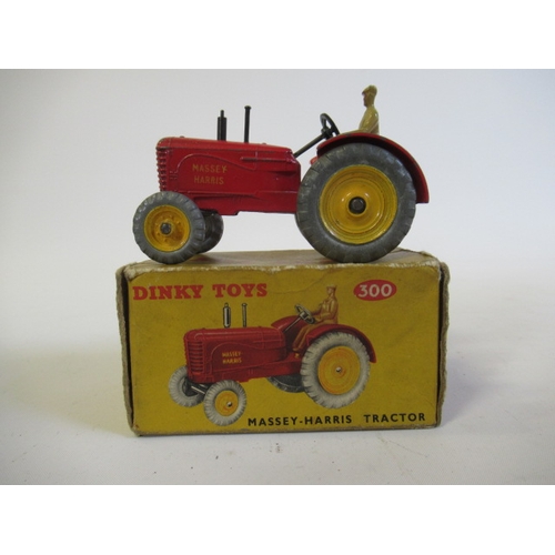 Dinky 300 Massey-Harris tractor, box F-P, model G (Est. plus... | Barnebys