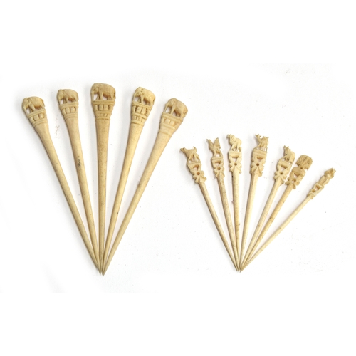 A collection of carved ivory toothpicks, one set in the form... | Barnebys
