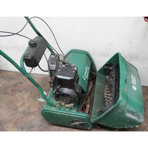 An old style Suffolk Punch petrol engine lawnmower with roll... | Barnebys