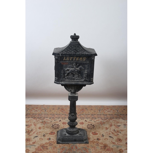 A CAST METAL FREE STANDING POST BOX of rectangular outline the shaped ...