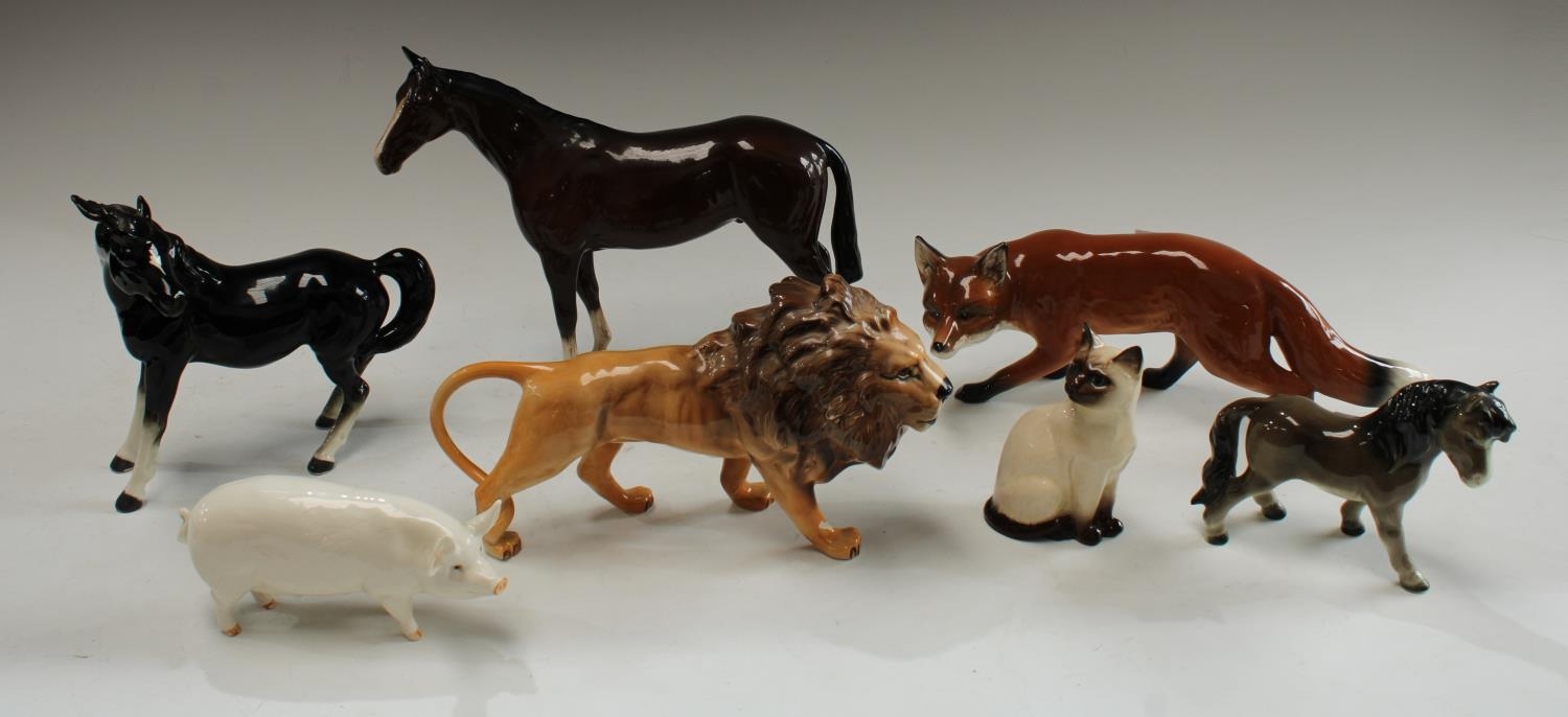 A Beswick model of a lion; other animal models, fox, Beswick pig Ch ...