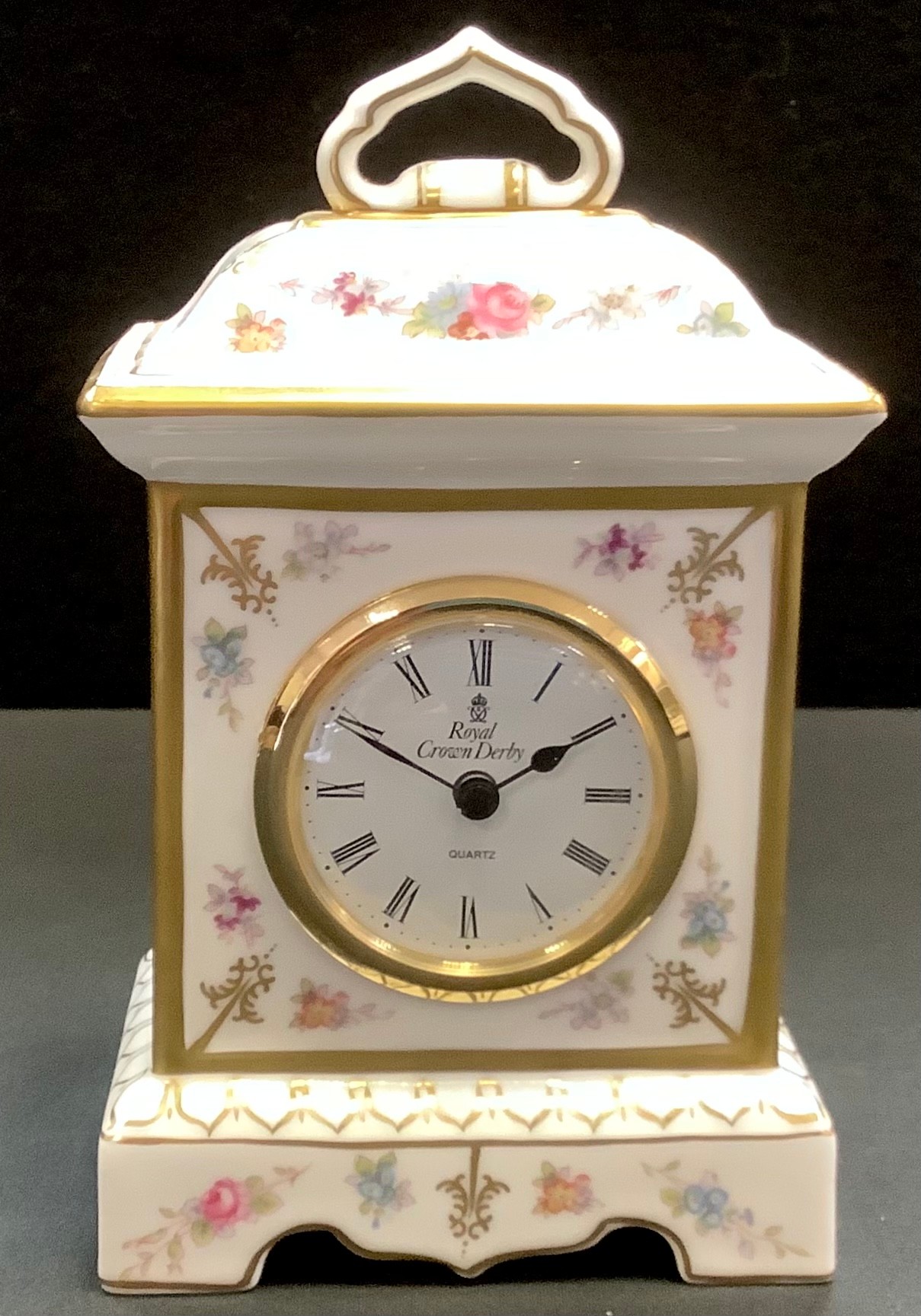 A Royal Crown Derby Royal Antoinette porcelain mantel clock, with ...