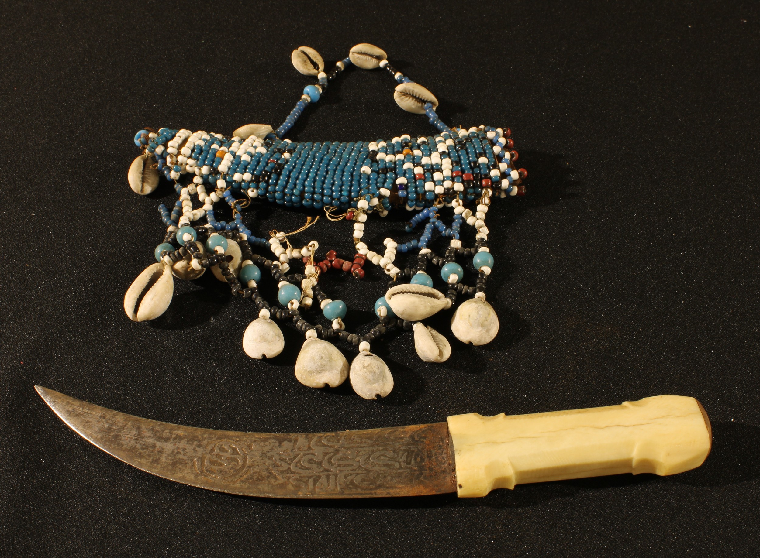 Tribal Art - a Sudanese Islamic dagger, the curved blade with Arabic ...