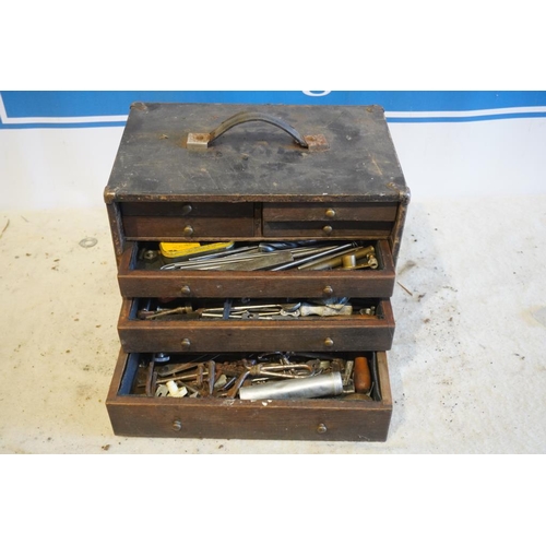Wooden toolbox full of engineering tools