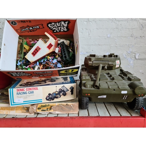 Various toys to include Action man tank, Sonic control racin... | Barnebys