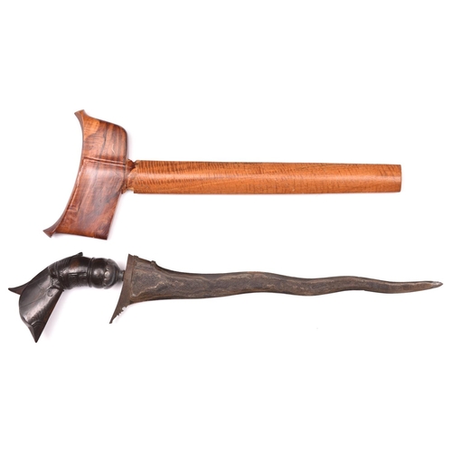 A Malayan kris, straight pamir blade 11½”, with dark wood ki... | Barnebys