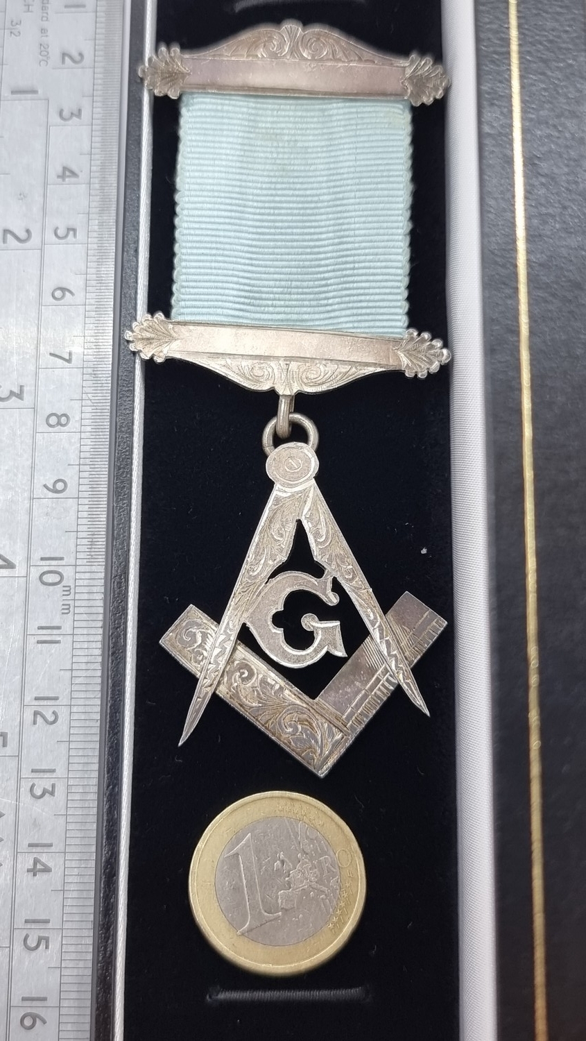 A collection of Masonic items, containing a Sterling silver Masonic ...