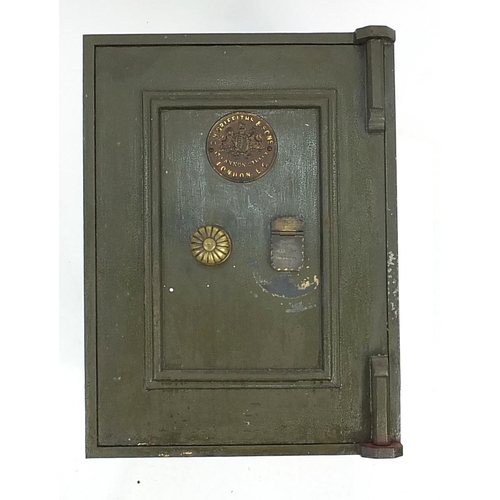 C H Griffiths & Sons cast iron safe with - auctions & price archive