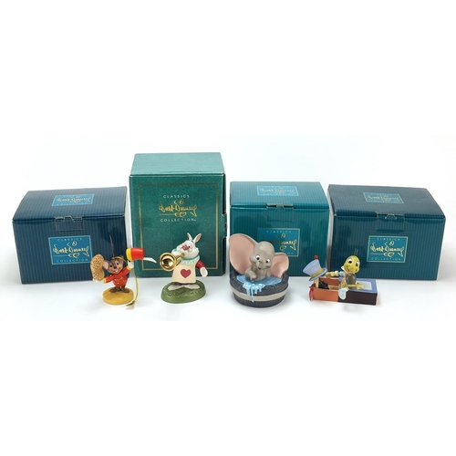 Four Walt Disney Classics Collection figures with boxes and ... | Barnebys