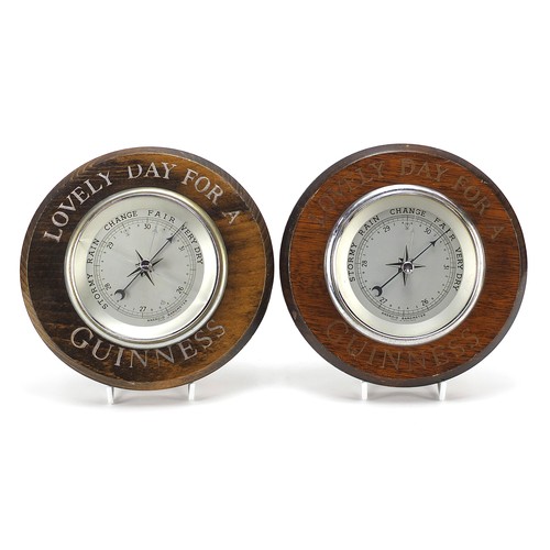 Two Guinness advertising circular oak wall barometers, each ... | Barnebys