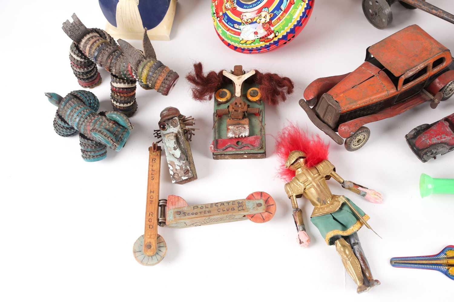 A collection of early-late 20th-century metal toys of various origin ...