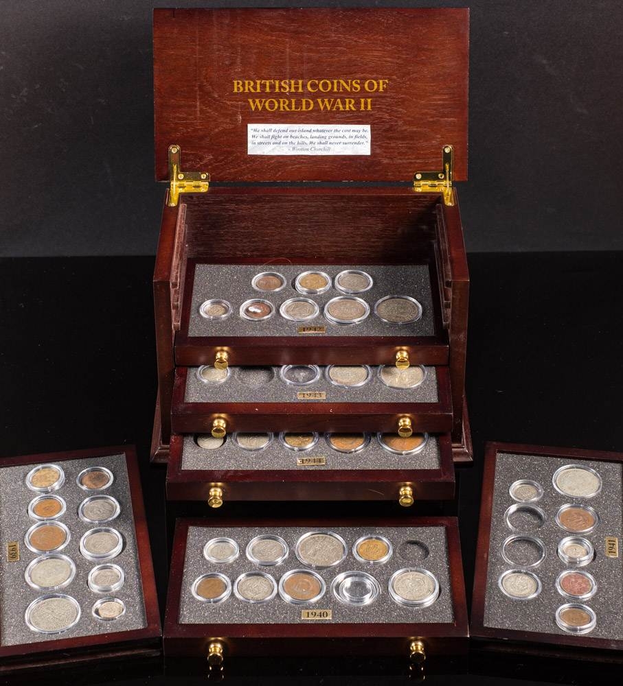 A set of Danbury Mint 'British Coins of World War II' in a collectors ...
