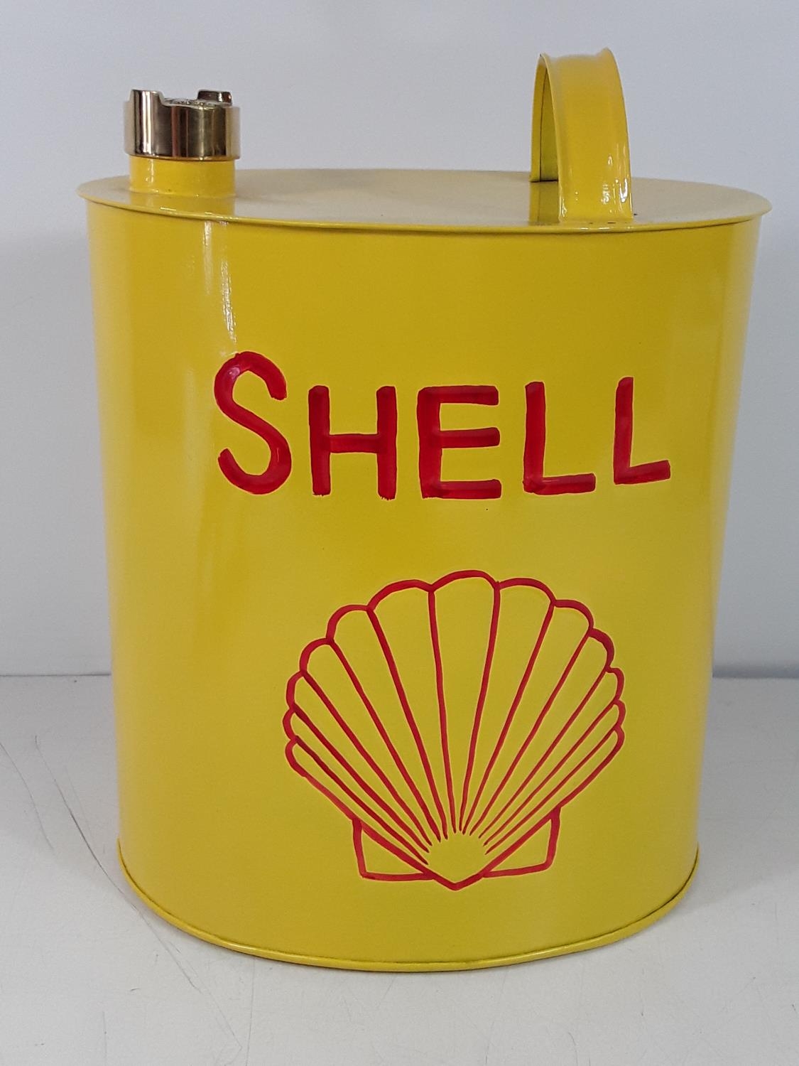 Shell oil can with brass cap