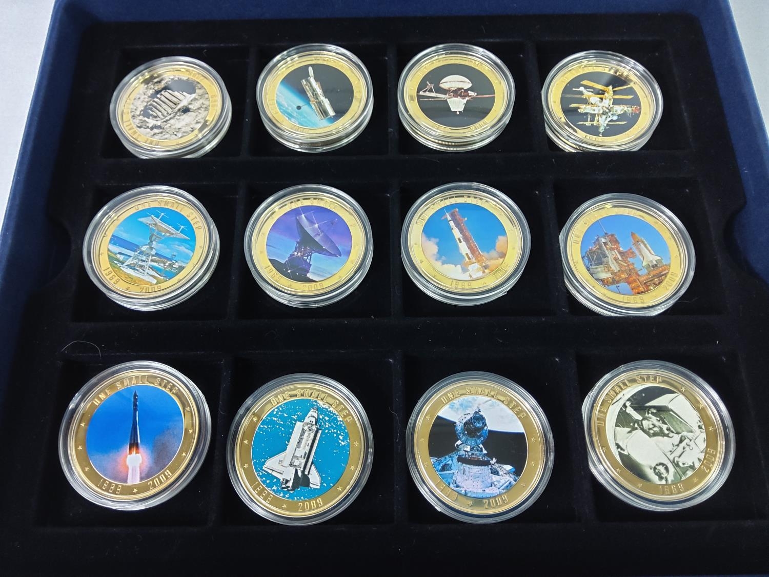 Set of 24 Space Exploration proof coins with certificates