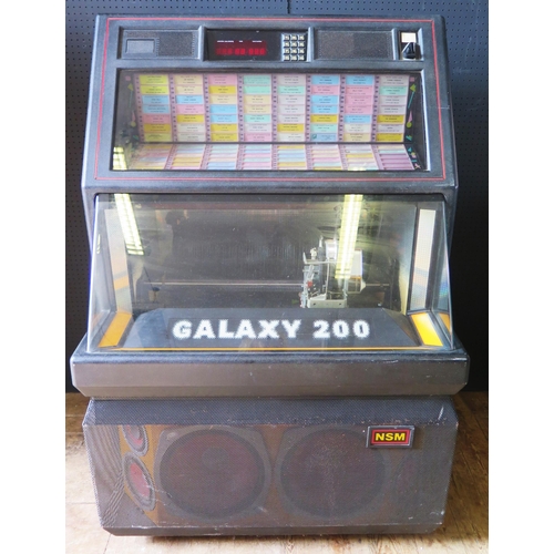 A NSM Galaxy 200 Jukebox, working order, one record sticking... | Barnebys