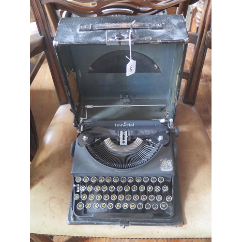 An IMPERIAL Portable Typewriter, c. 1928 | Barnebys