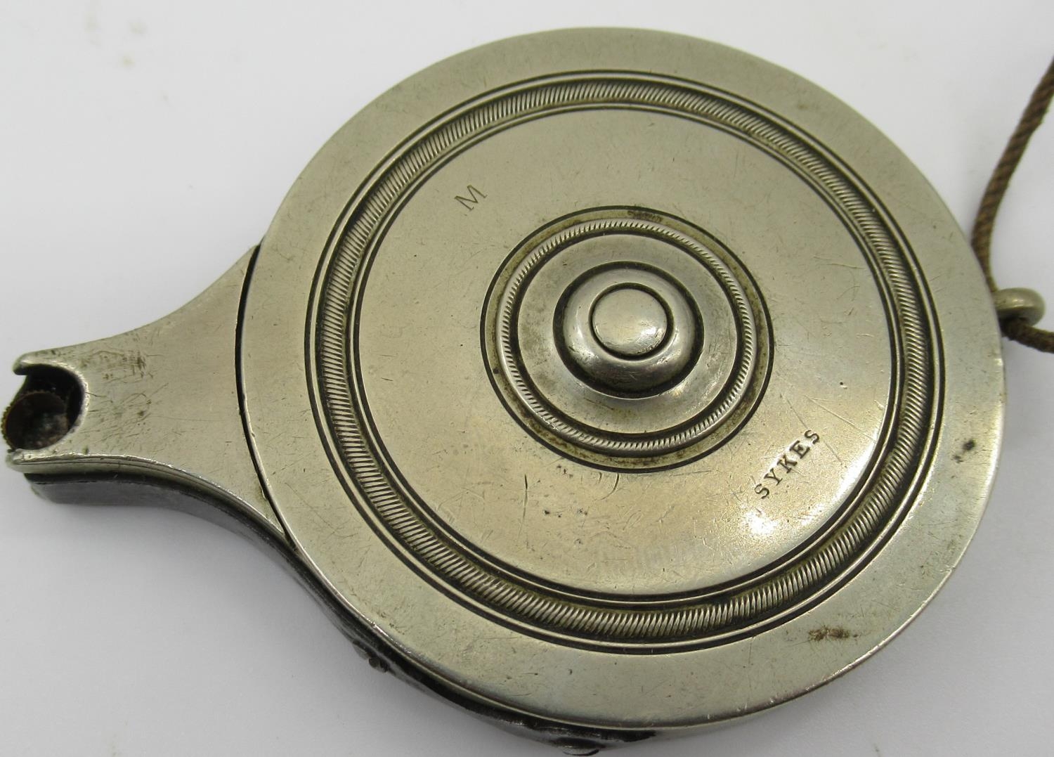 Circular Sykes percussion cap dispenser - auctions & price archive