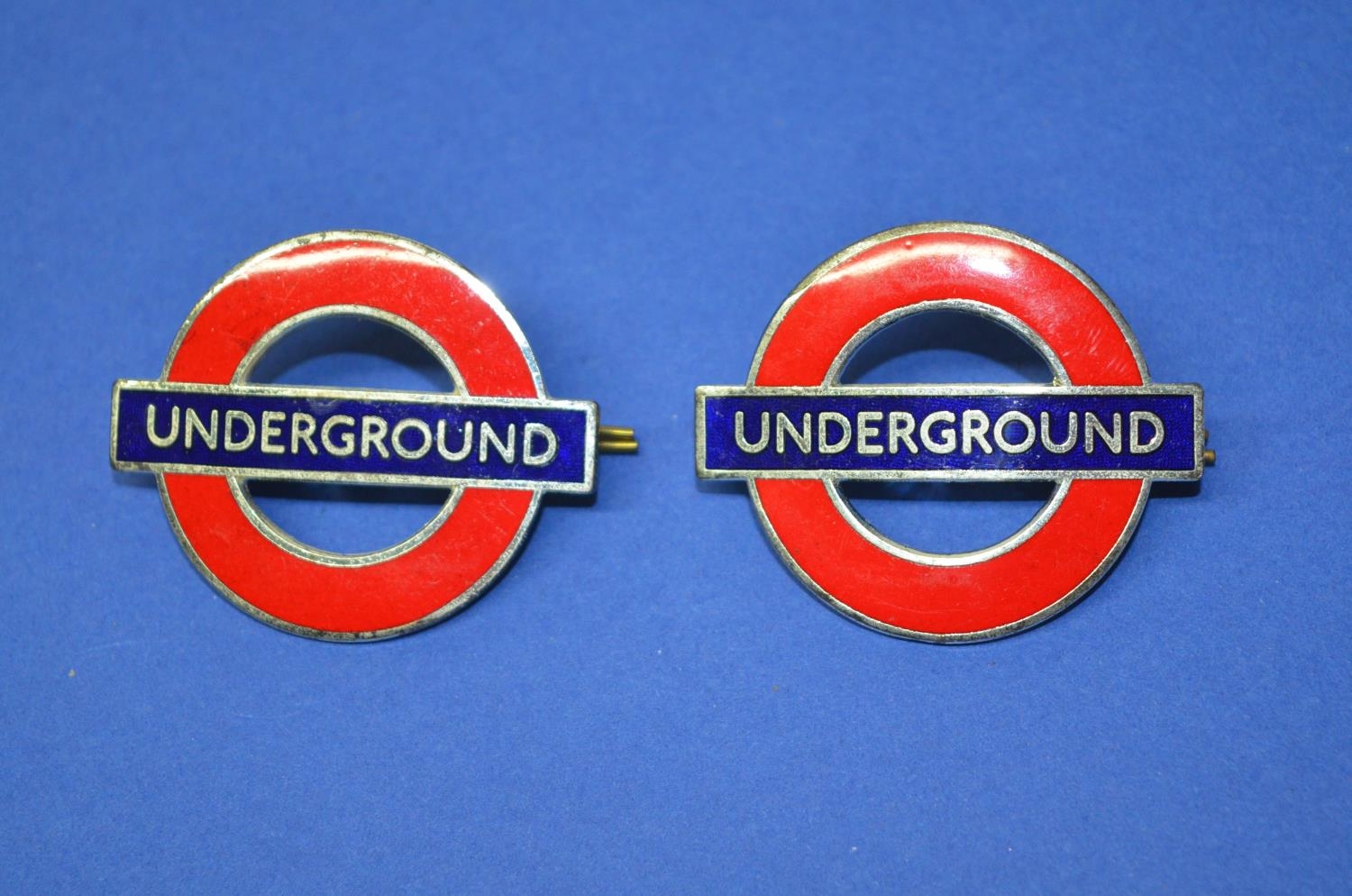 Two London Underground cap badges with - auctions & price archive