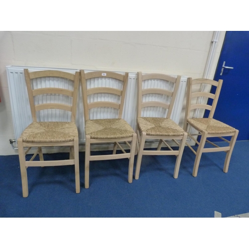 Set of four ladder-back kitchen chairs with woven seats.&nbs... | Barnebys