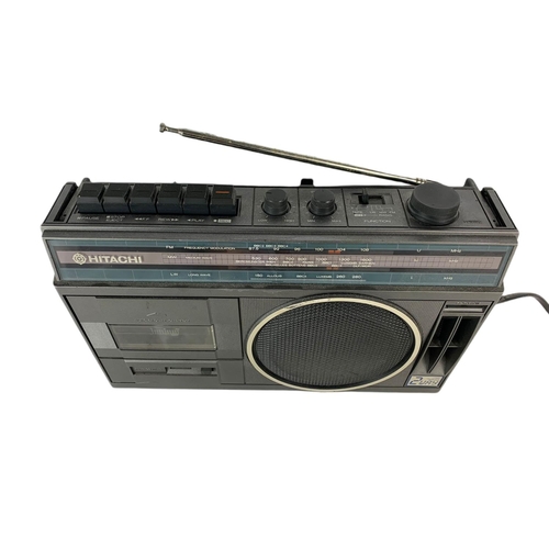 Vintage Hitachi radio cassette deck with lead. 32x20cm